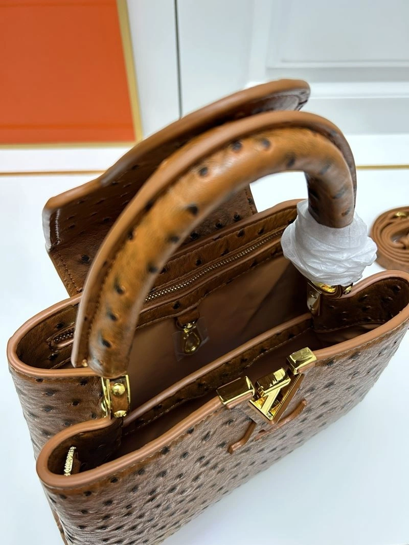 Brand-authenticated Louis Vuitton Top Handle Bags