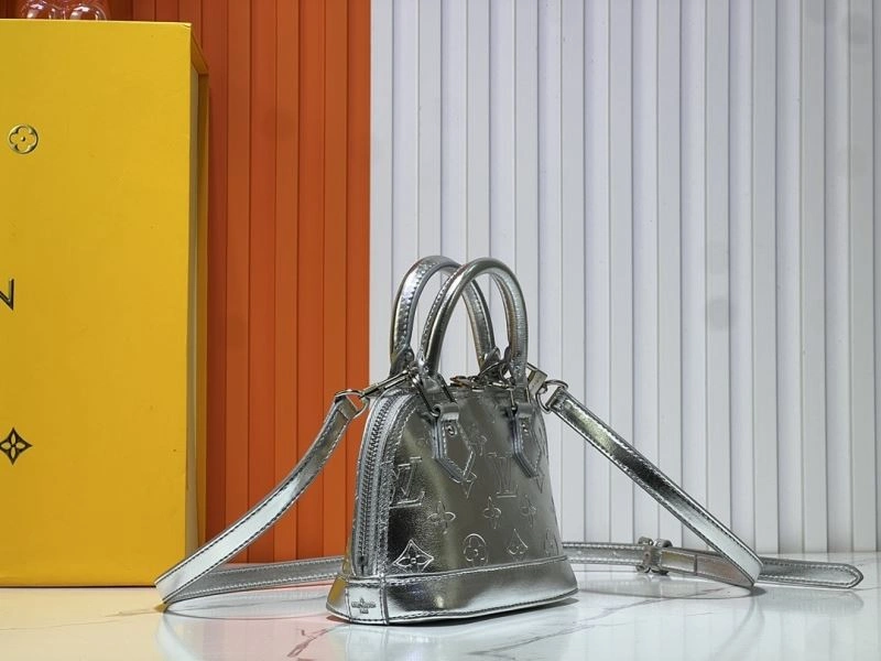 Brand-authenticated Louis Vuitton Top Handle Bags