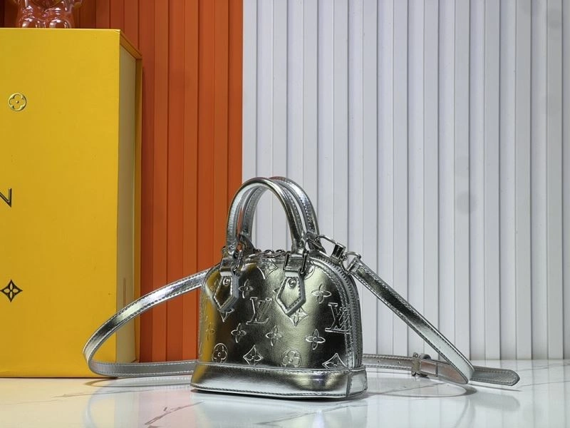 Brand-authenticated Louis Vuitton Top Handle Bags