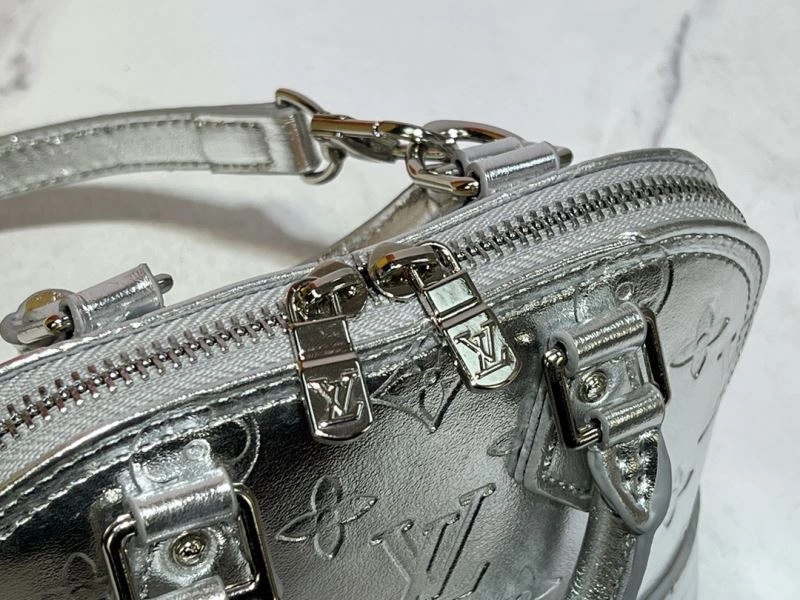 Brand-authenticated Louis Vuitton Top Handle Bags
