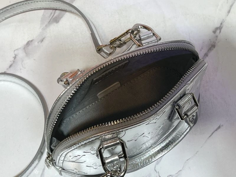 Brand-authenticated Louis Vuitton Top Handle Bags