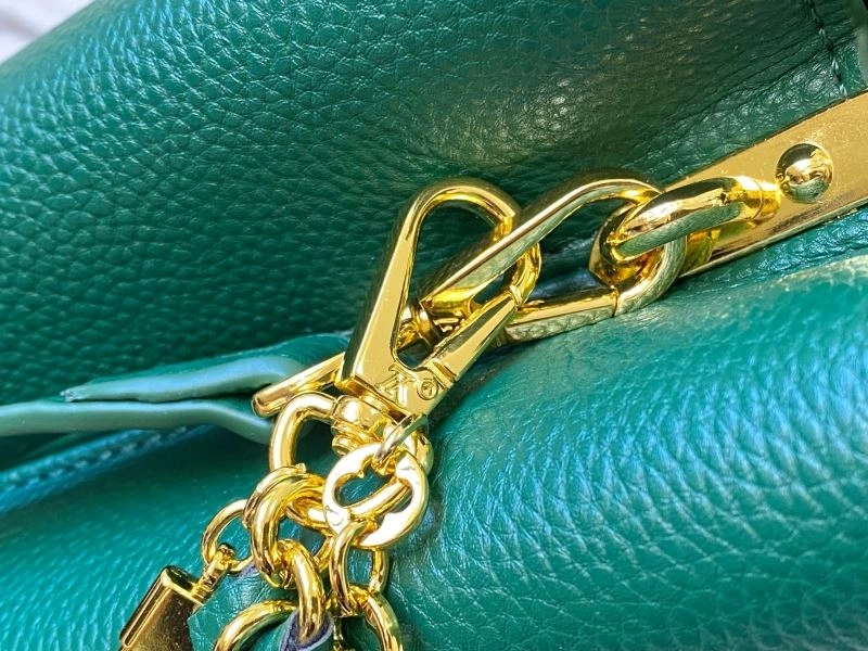 Indistinguishable Louis Vuitton Top Handle Bags