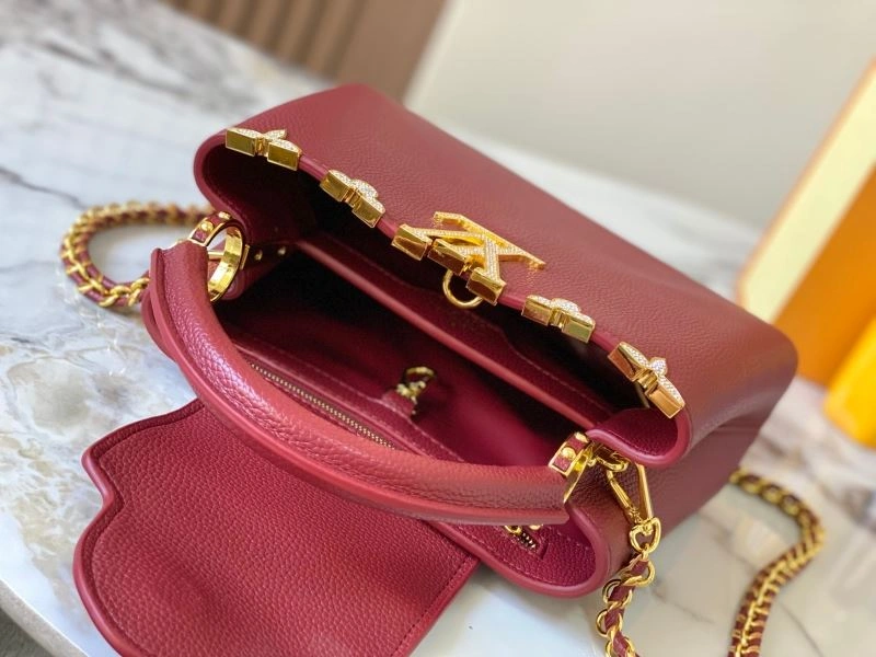 Indistinguishable Louis Vuitton Top Handle Bags