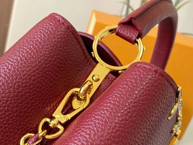 Indistinguishable Louis Vuitton Top Handle Bags