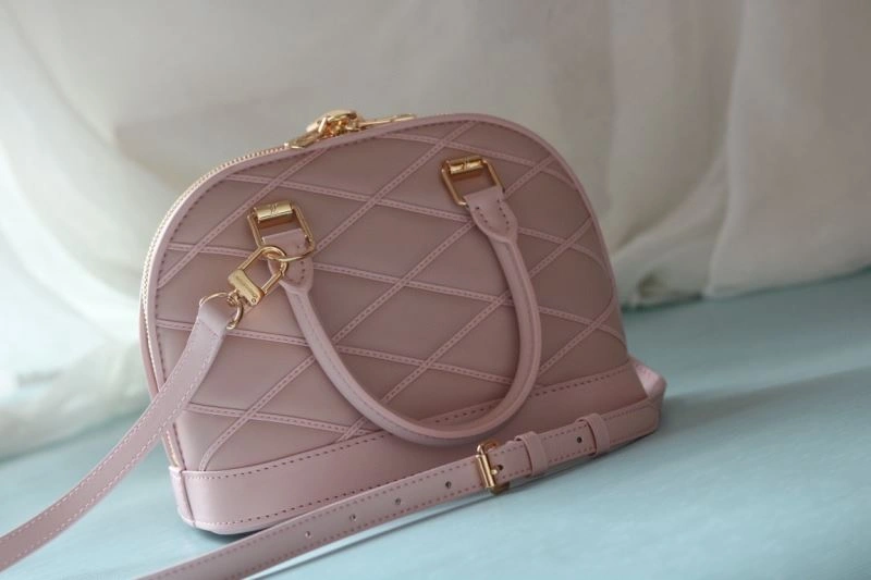 Value-priced Louis Vuitton Top Handle Bags