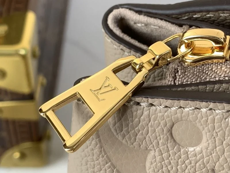 Indistinguishable Louis Vuitton Top Handle Bags
