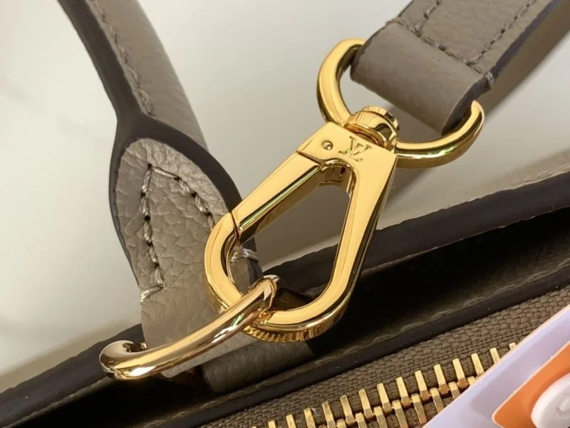 Indistinguishable Louis Vuitton Top Handle Bags