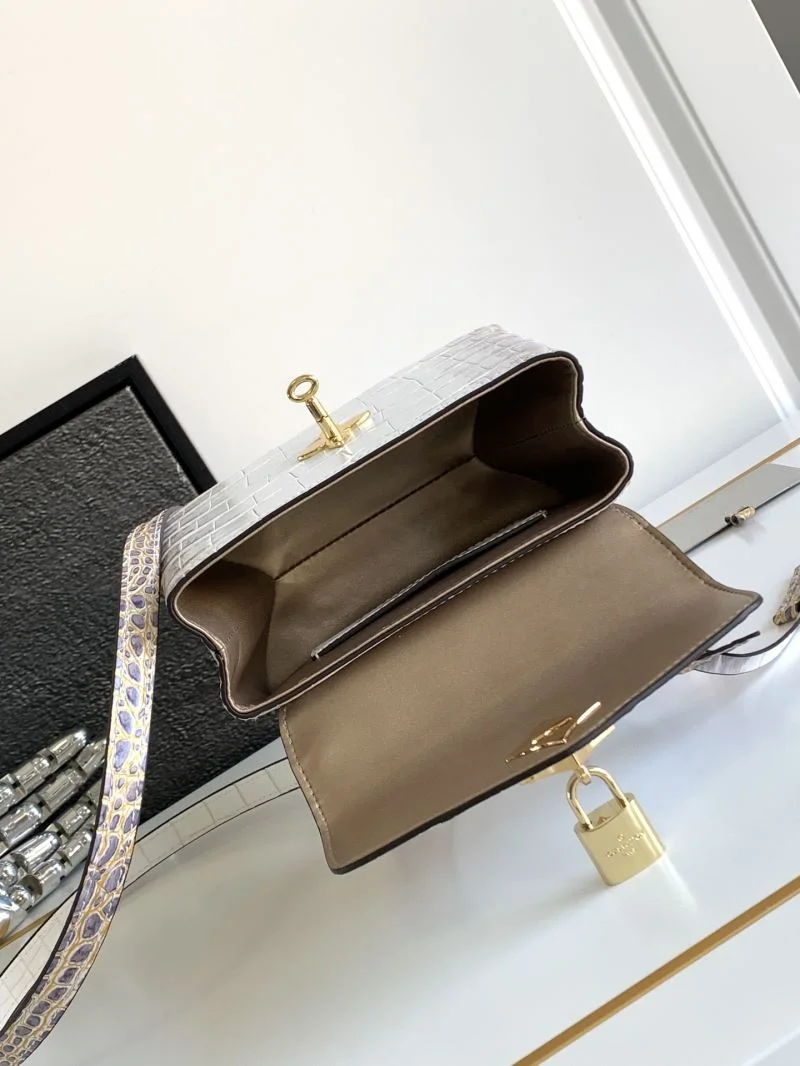 Reasonably priced Louis Vuitton Top Handle Bags