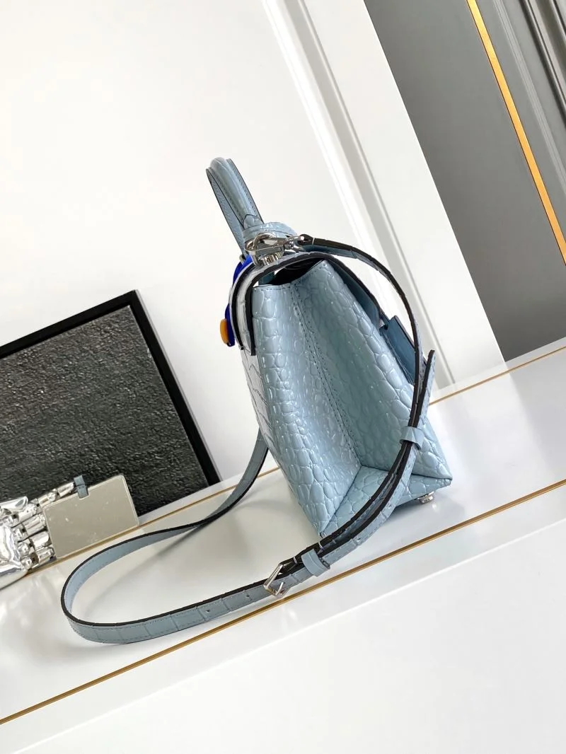 Brand-authenticated Louis Vuitton Top Handle Bags