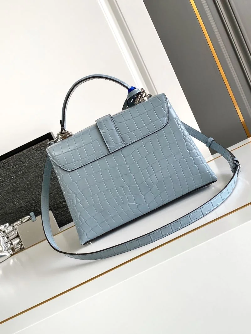 Brand-authenticated Louis Vuitton Top Handle Bags