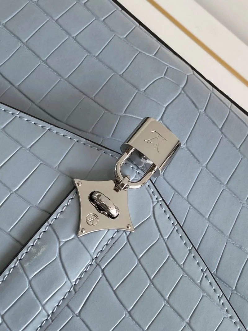 Brand-authenticated Louis Vuitton Top Handle Bags