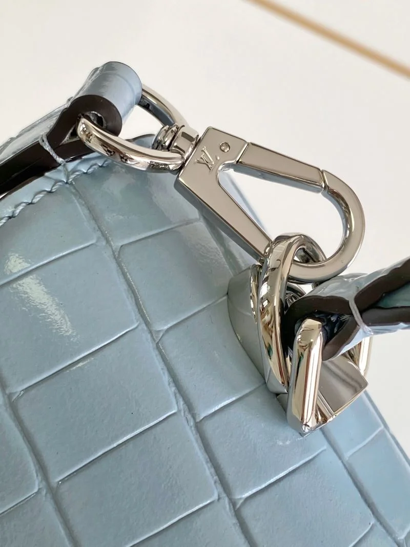 Brand-authenticated Louis Vuitton Top Handle Bags