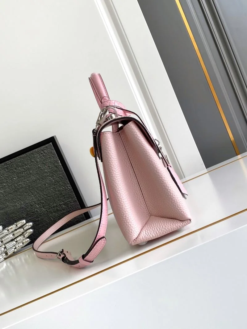 Indistinguishable Louis Vuitton Top Handle Bags