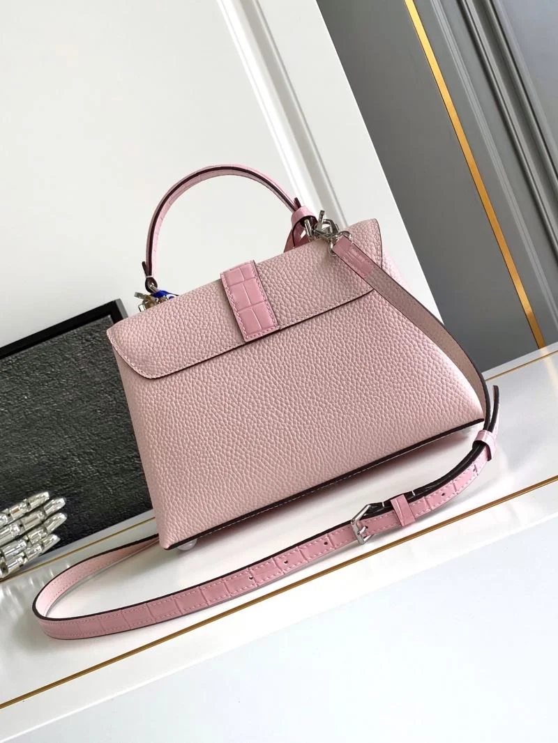 Indistinguishable Louis Vuitton Top Handle Bags