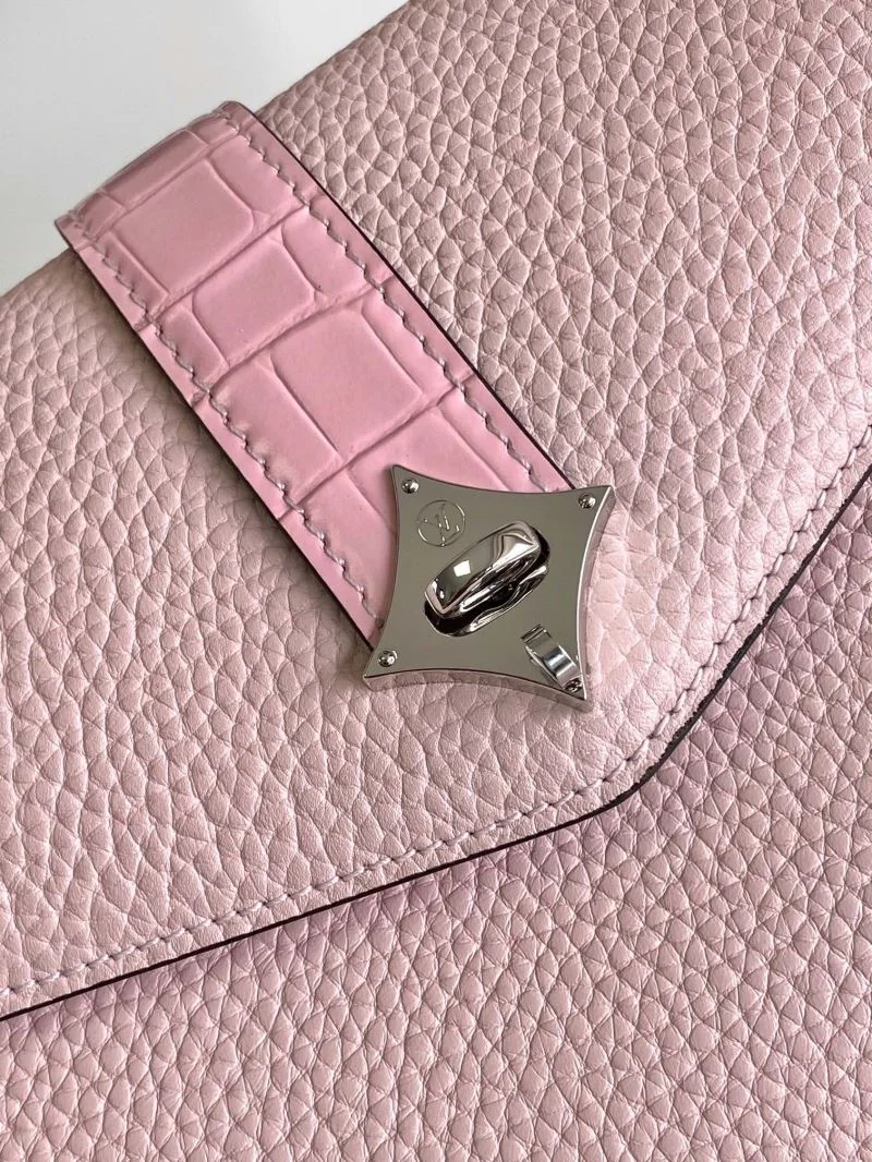 Indistinguishable Louis Vuitton Top Handle Bags