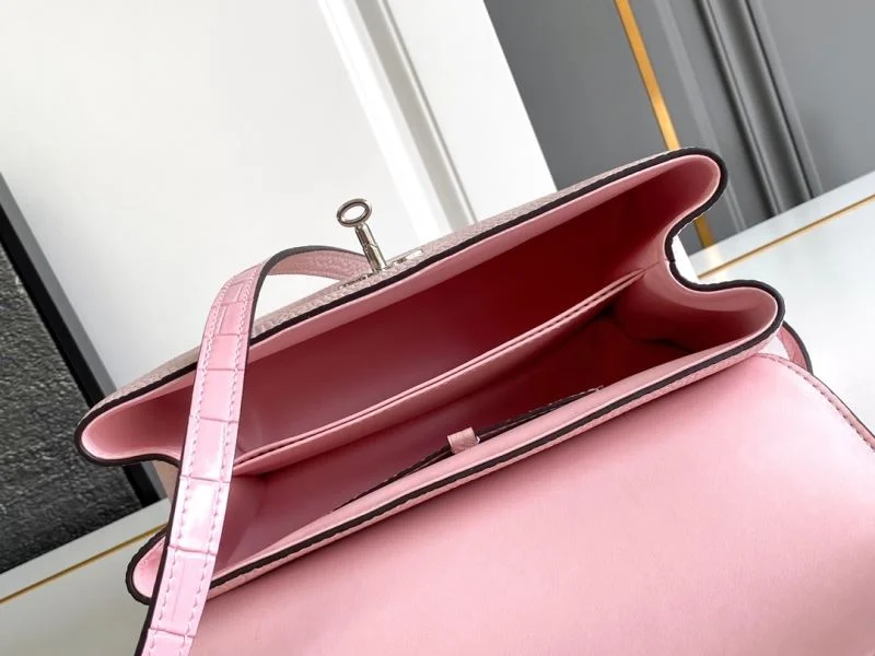 Indistinguishable Louis Vuitton Top Handle Bags