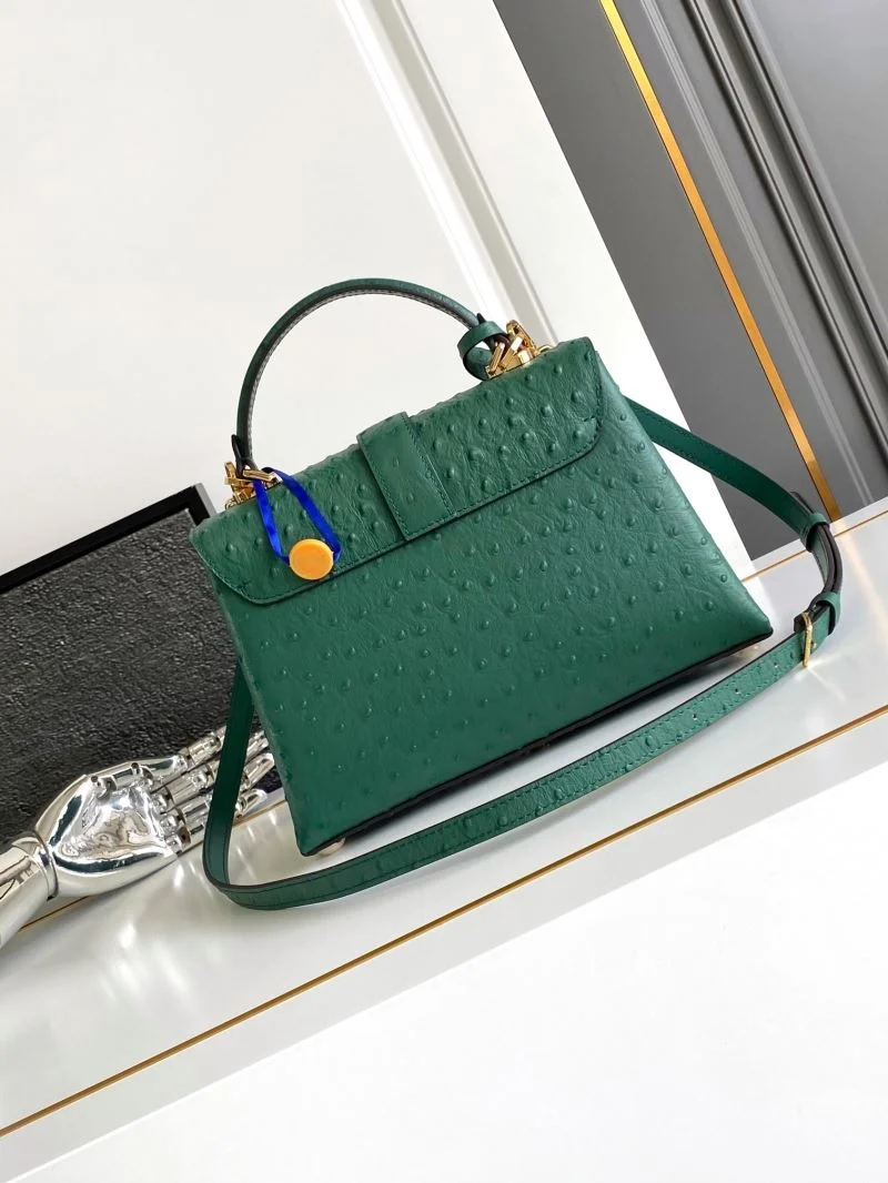 Brand-authenticated Louis Vuitton Top Handle Bags