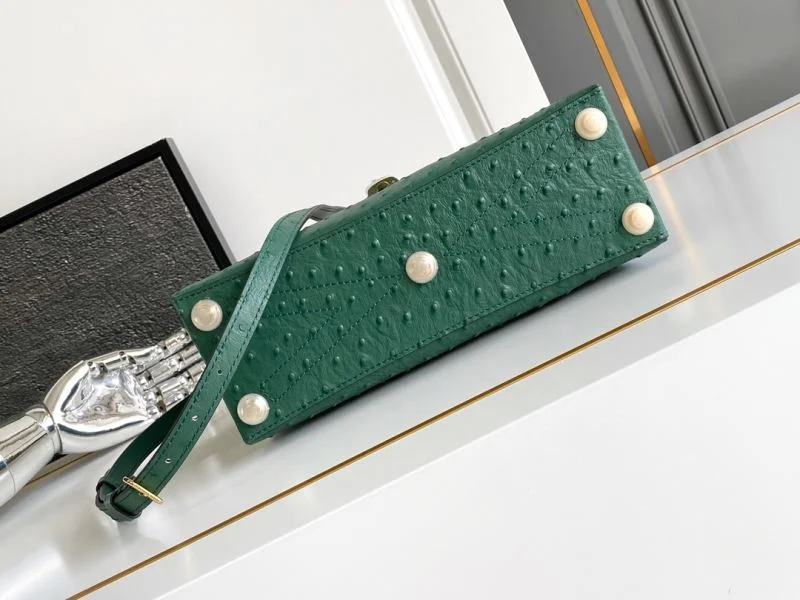 Brand-authenticated Louis Vuitton Top Handle Bags