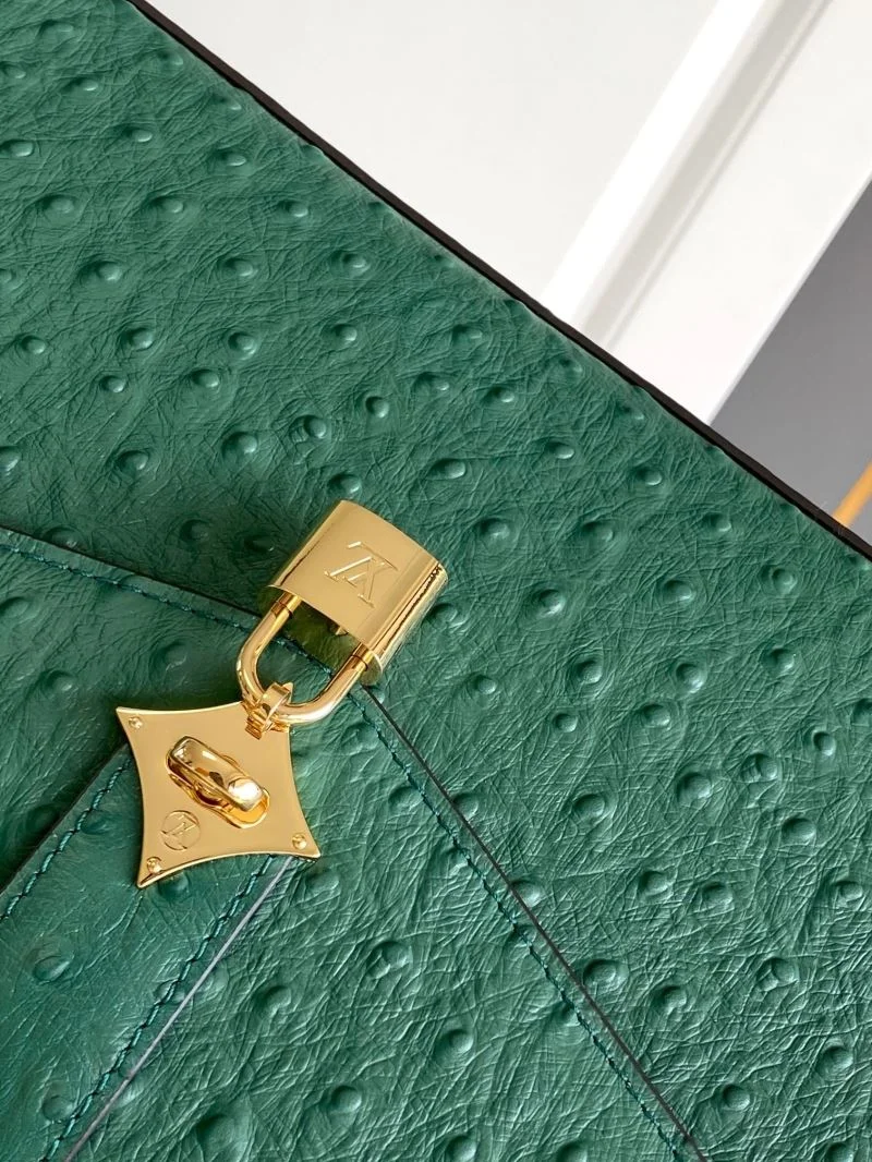 Brand-authenticated Louis Vuitton Top Handle Bags