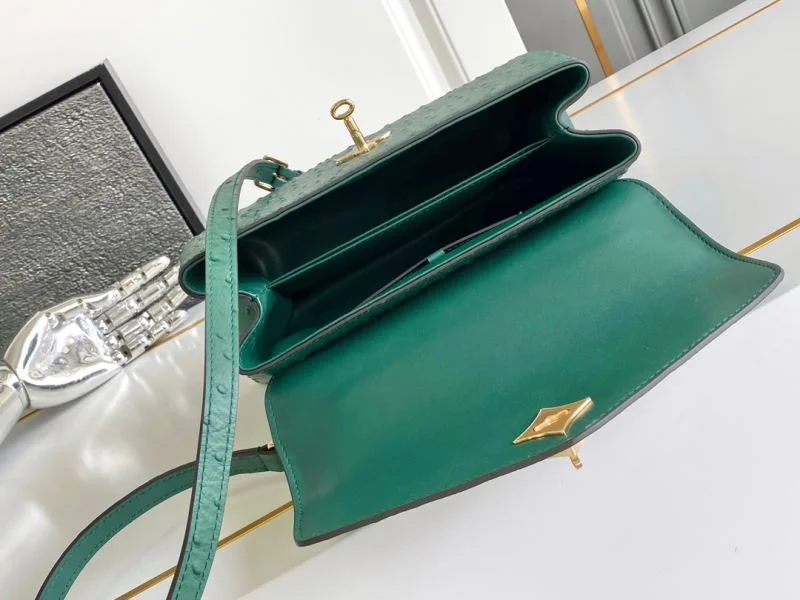 Brand-authenticated Louis Vuitton Top Handle Bags