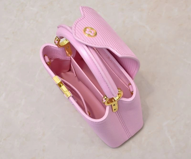 Brand-authenticated Louis Vuitton Top Handle Bags