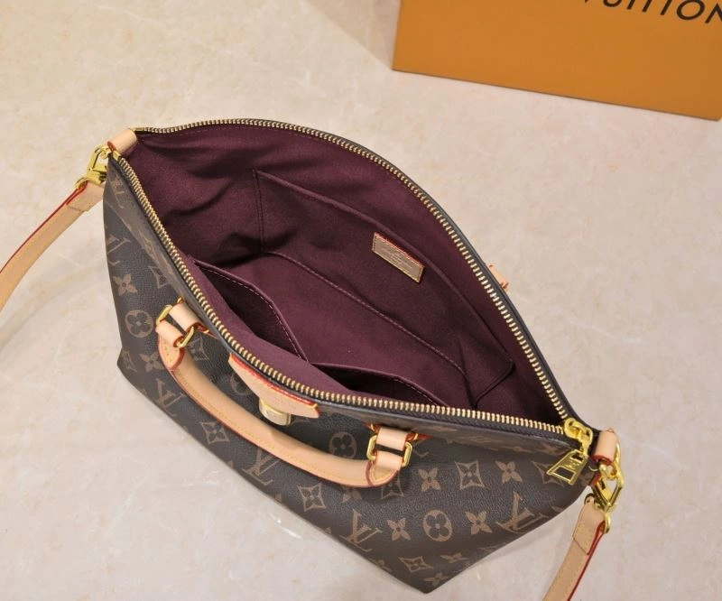 Brand-authenticated Louis Vuitton Top Handle Bags