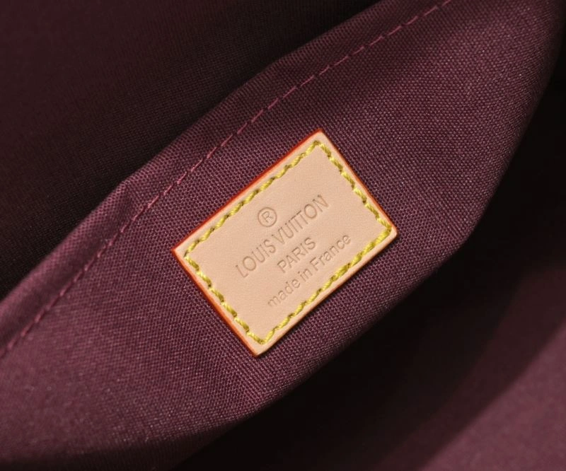Brand-authenticated Louis Vuitton Top Handle Bags
