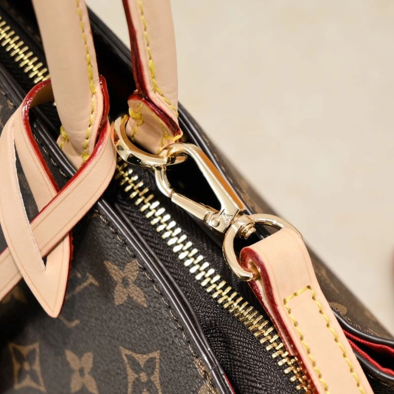 Value-priced Louis Vuitton Top Handle Bags