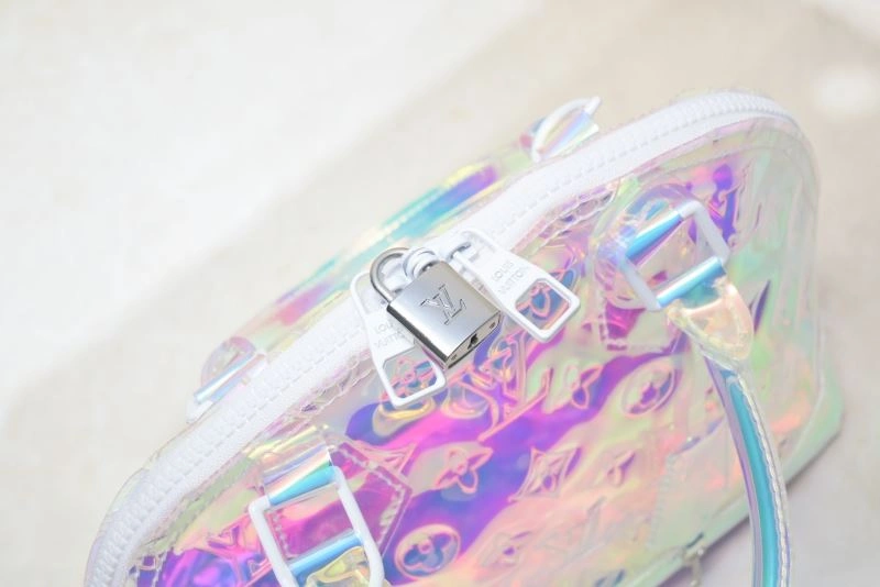 Brand-authenticated Louis Vuitton Top Handle Bags