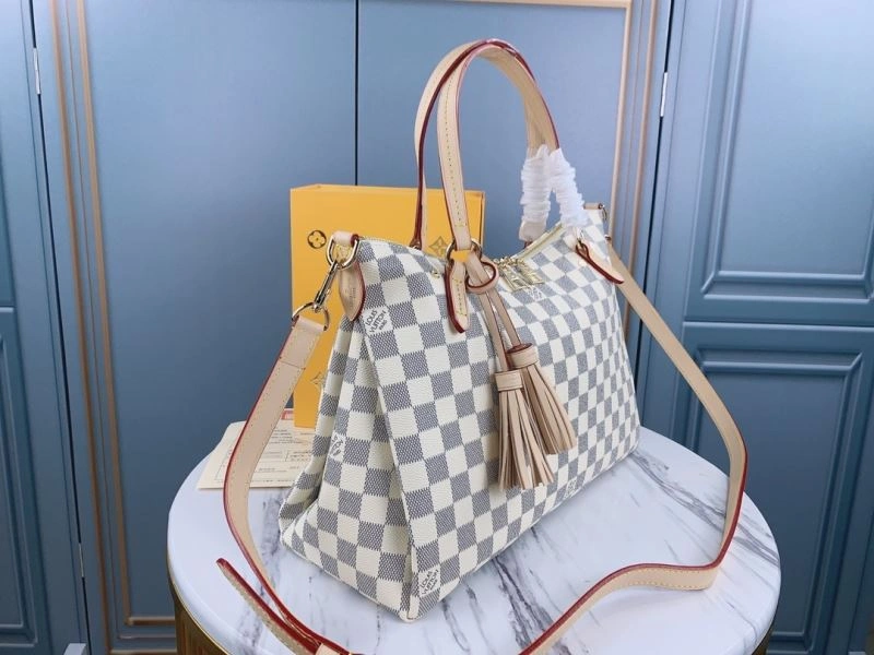 Brand-authenticated Louis Vuitton Top Handle Bags