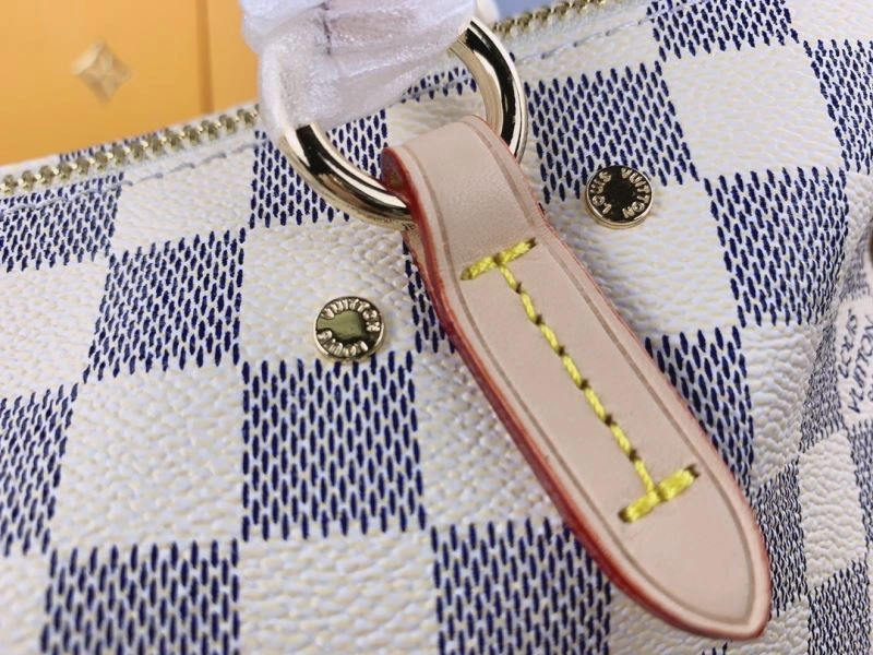 Brand-authenticated Louis Vuitton Top Handle Bags