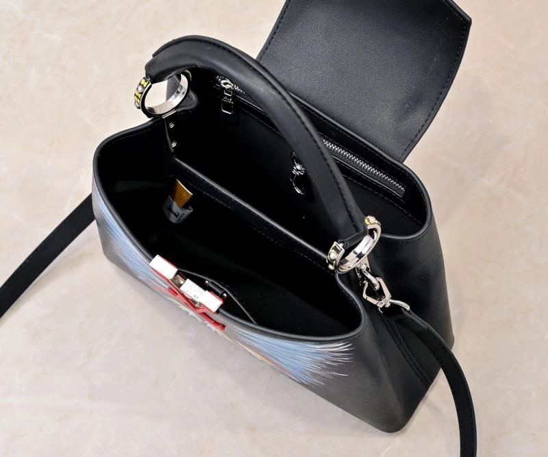 Brand-authenticated Louis Vuitton Top Handle Bags