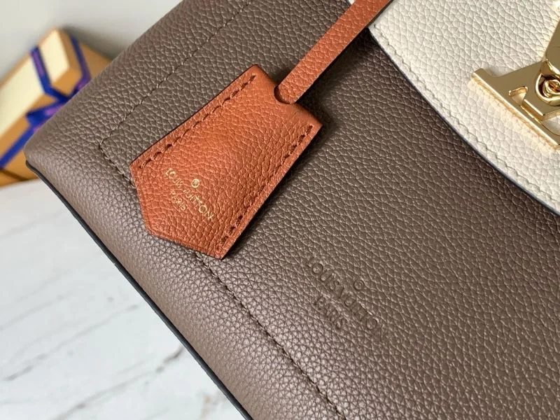 Brand-authenticated Louis Vuitton Top Handle Bags