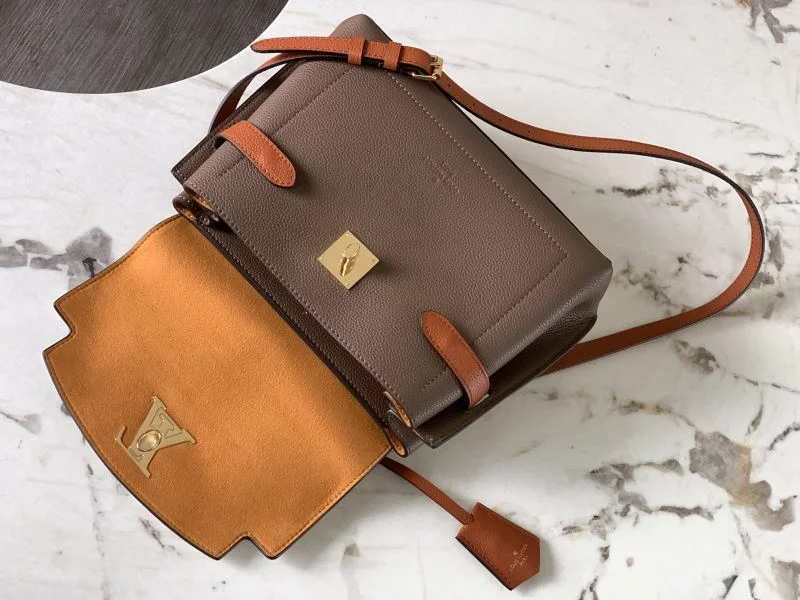 Brand-authenticated Louis Vuitton Top Handle Bags