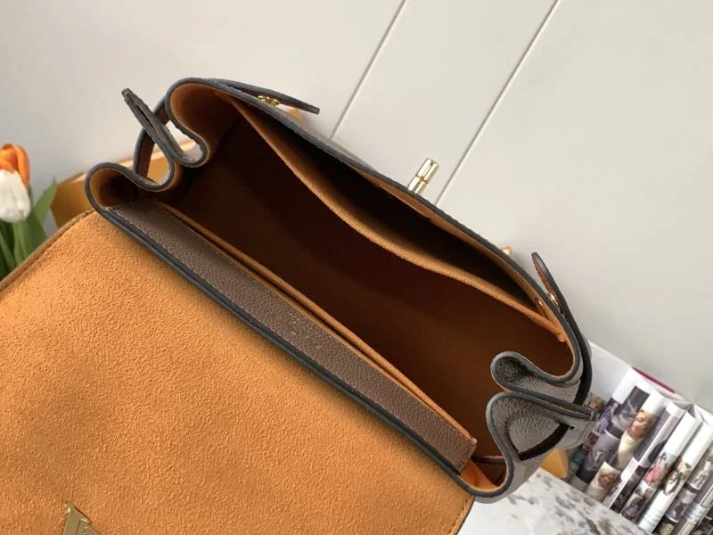 Brand-authenticated Louis Vuitton Top Handle Bags