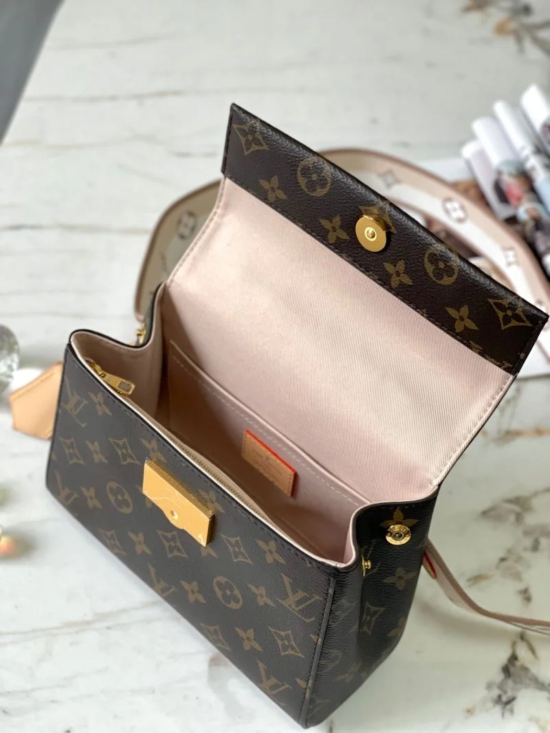 Value-priced Louis Vuitton Top Handle Bags
