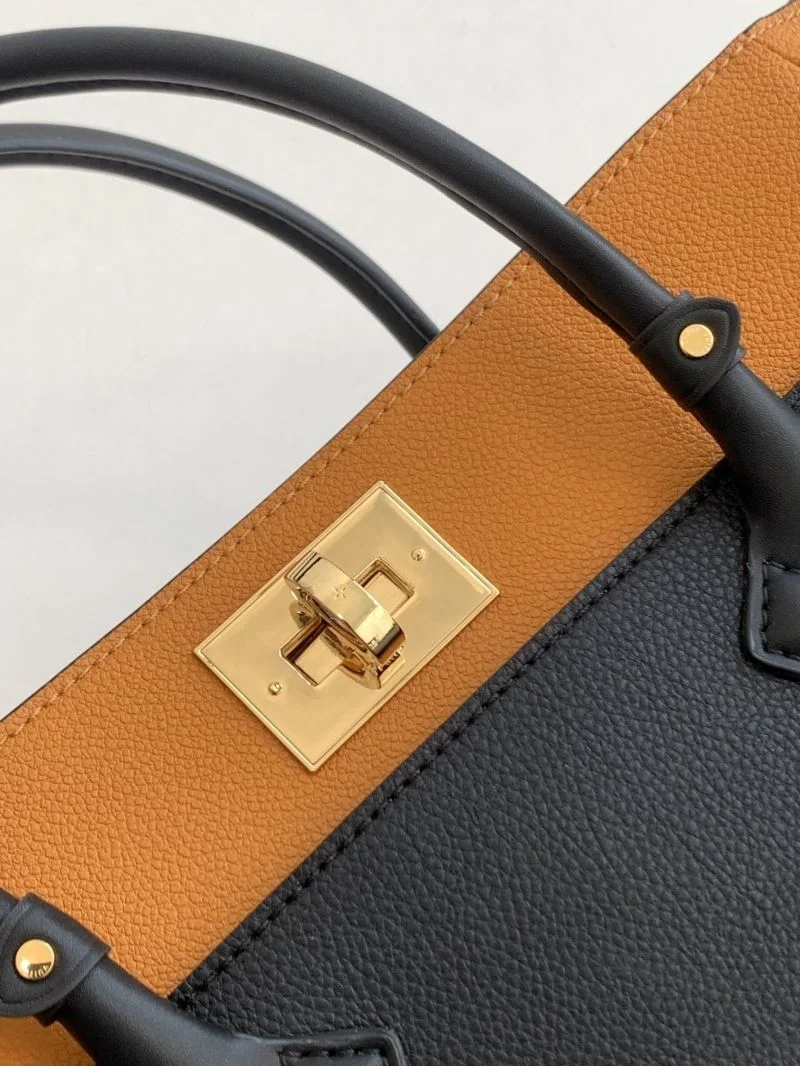 Value-priced Louis Vuitton Top Handle Bags