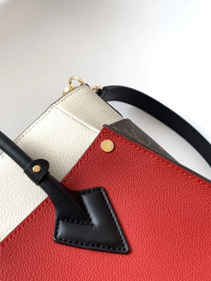 Brand-authenticated Louis Vuitton Top Handle Bags