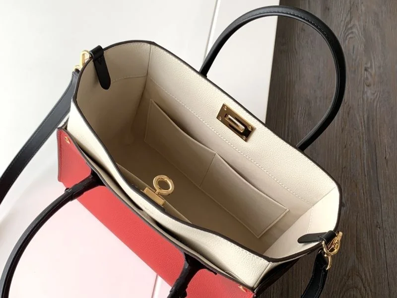 Brand-authenticated Louis Vuitton Top Handle Bags