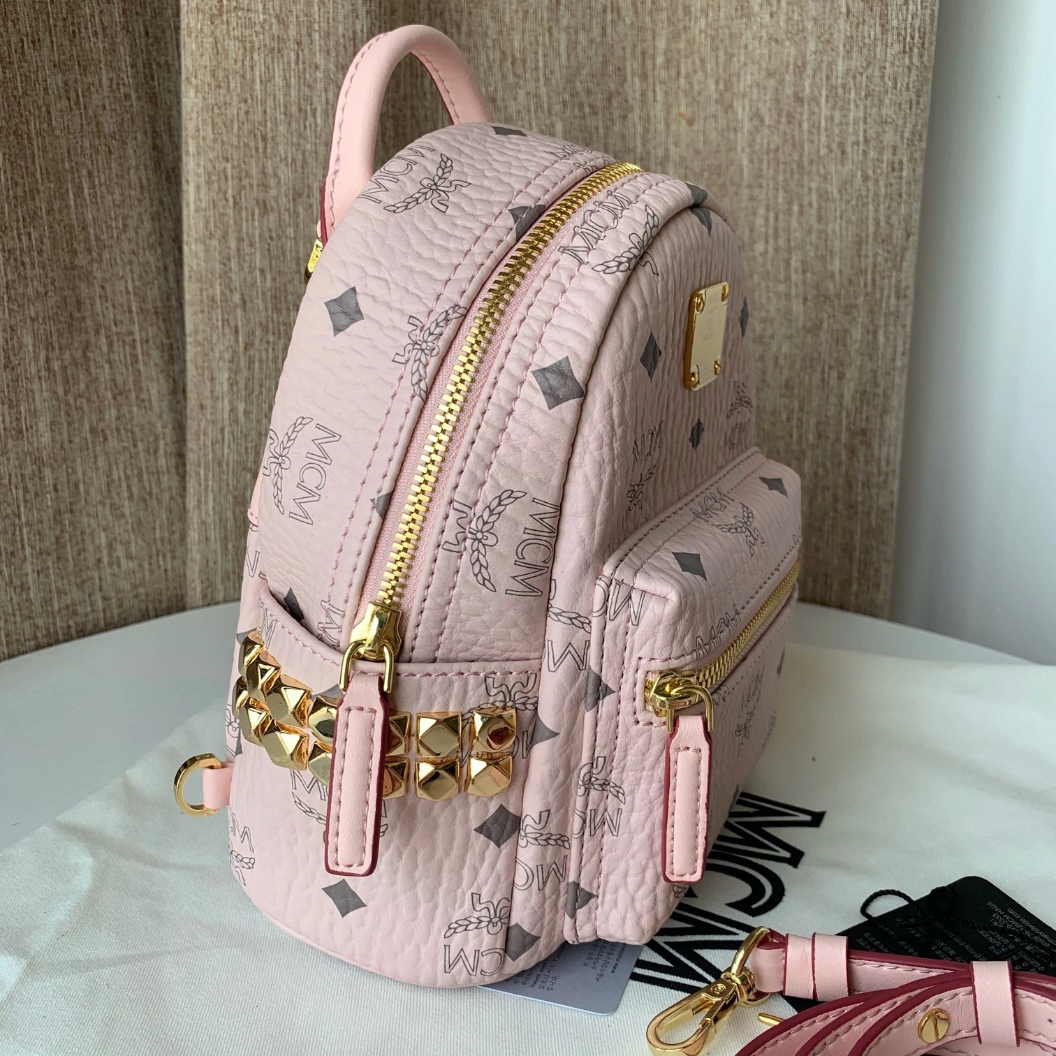 Indistinguishable MCM Backpacks