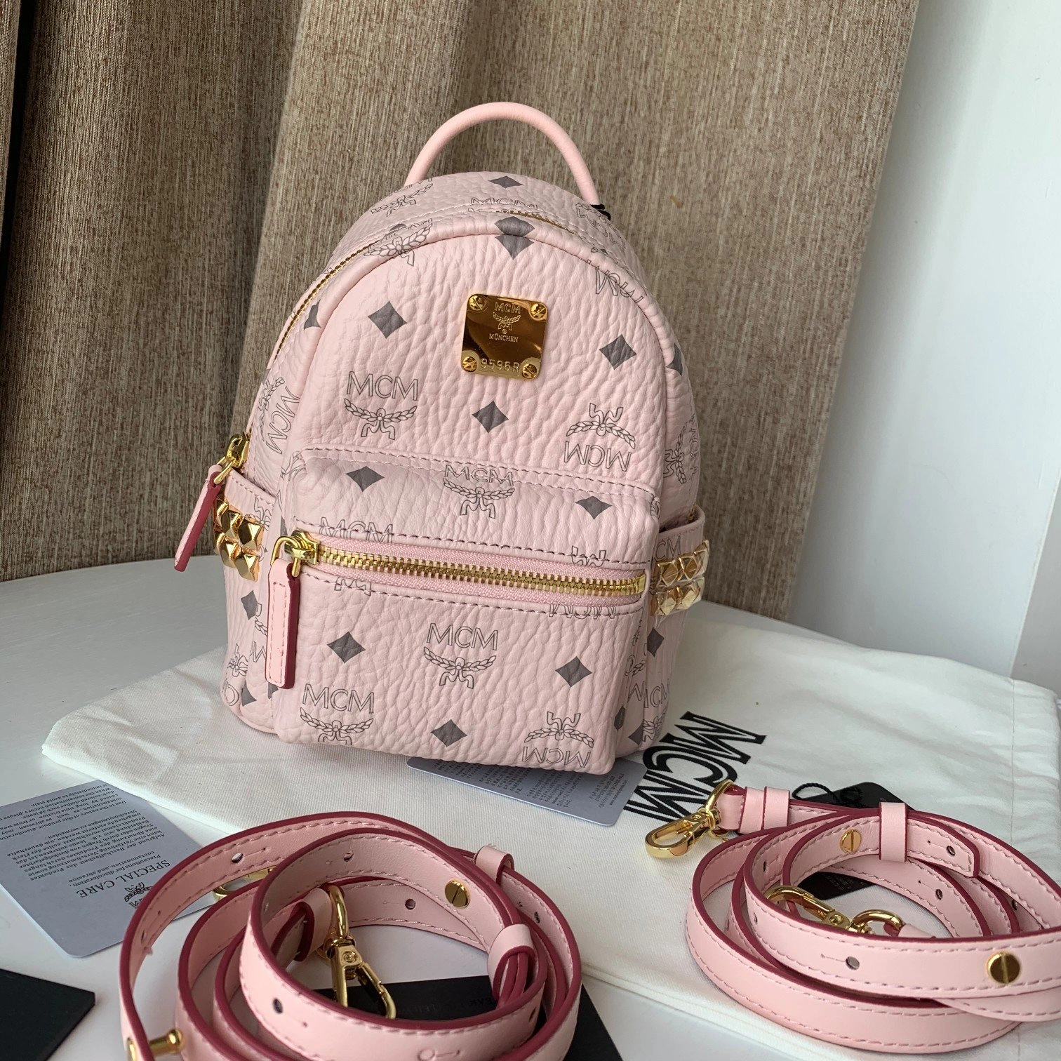Indistinguishable MCM Backpacks