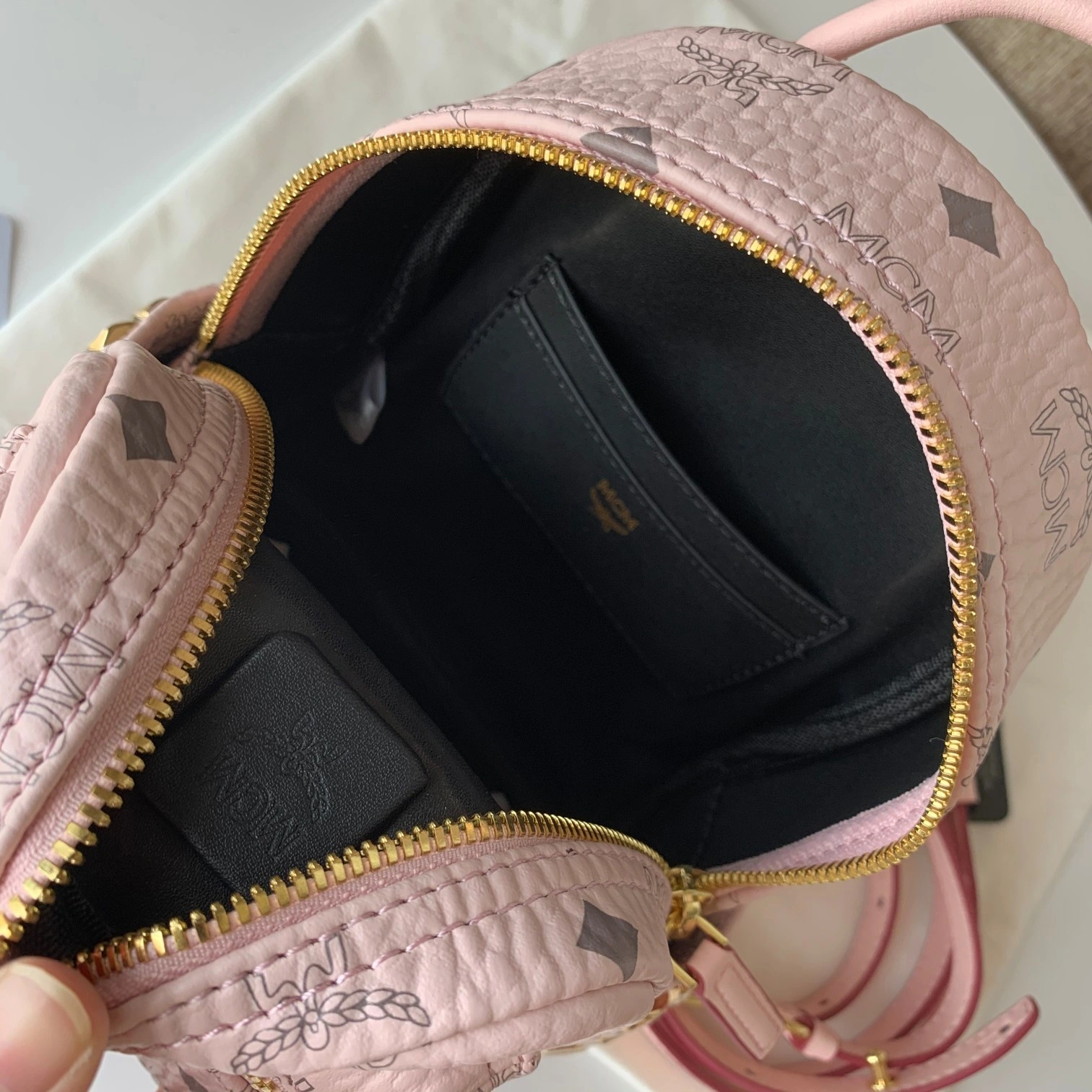 Indistinguishable MCM Backpacks