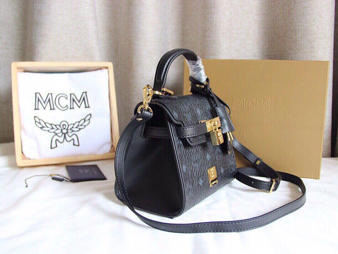 Indistinguishable MCM Top Handle Bags