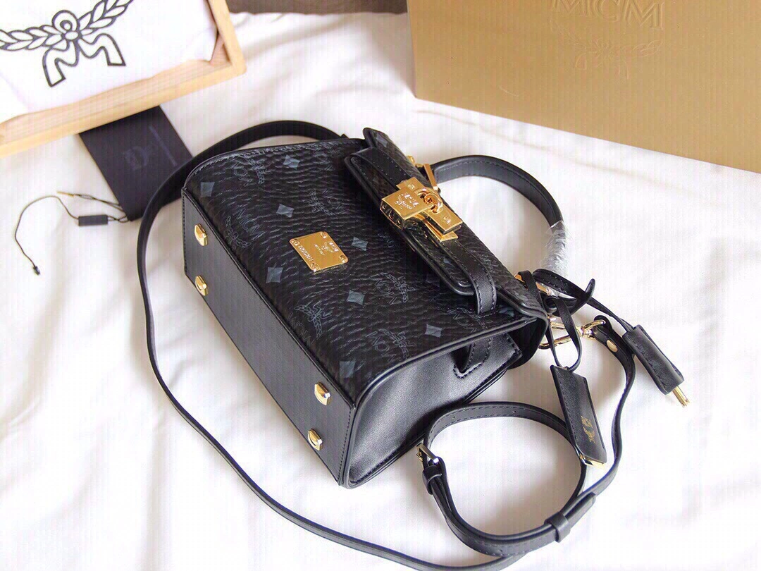 Indistinguishable MCM Top Handle Bags