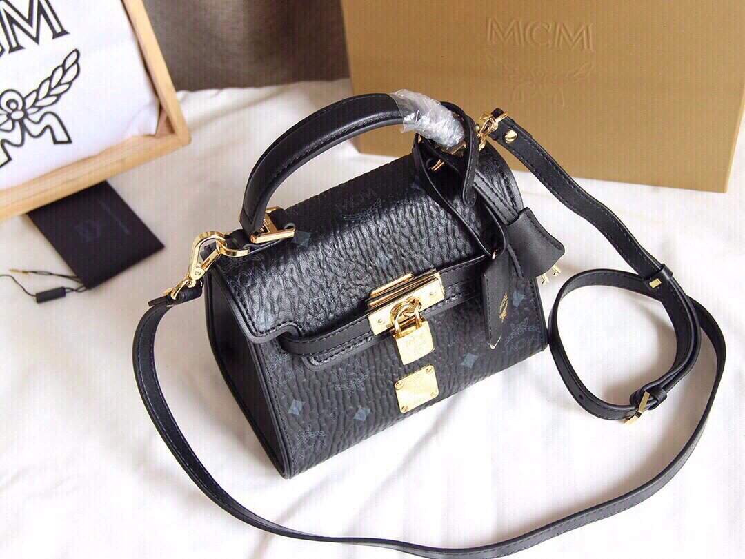 Indistinguishable MCM Top Handle Bags