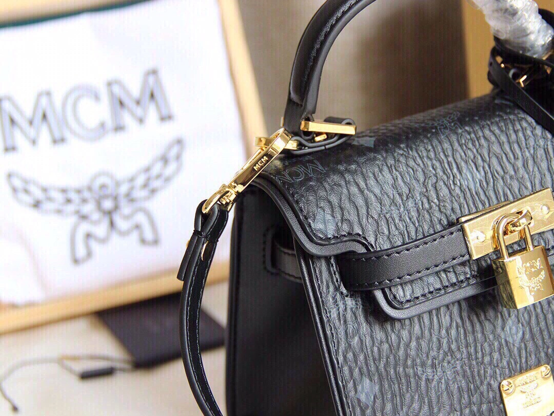 Indistinguishable MCM Top Handle Bags