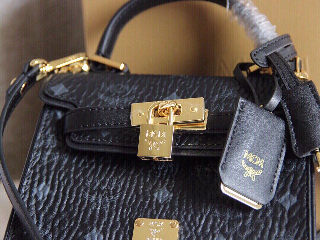 Indistinguishable MCM Top Handle Bags