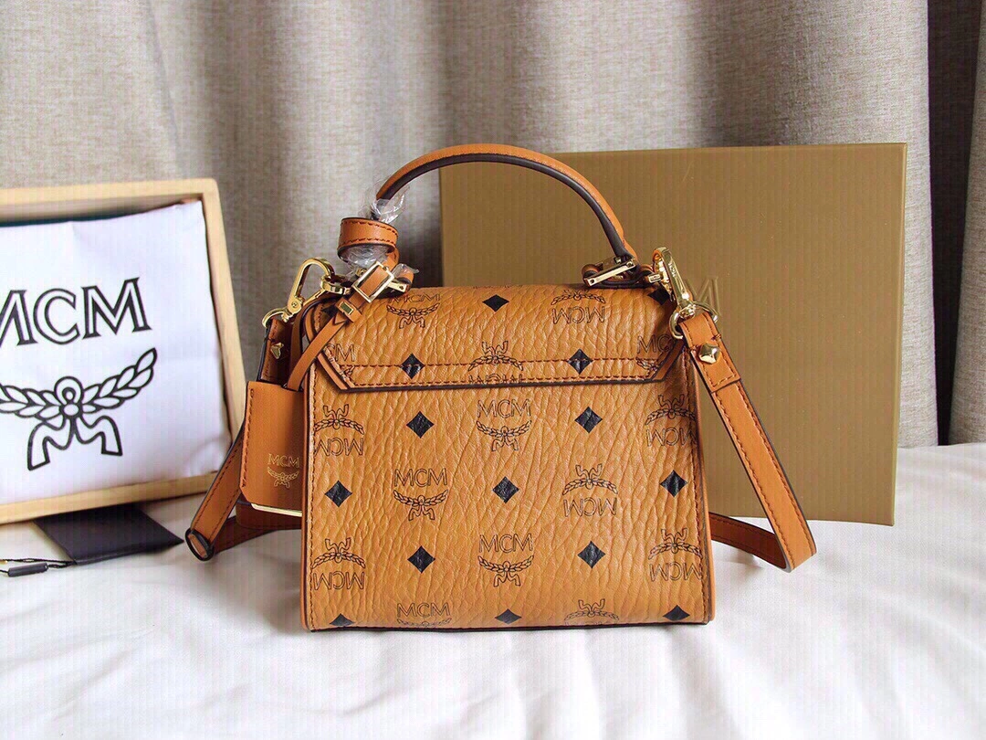 Indistinguishable MCM Top Handle Bags