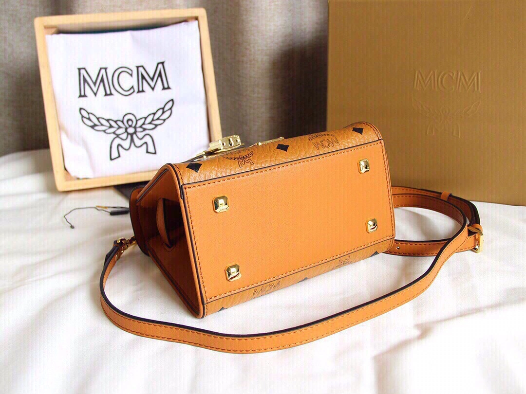 Indistinguishable MCM Top Handle Bags