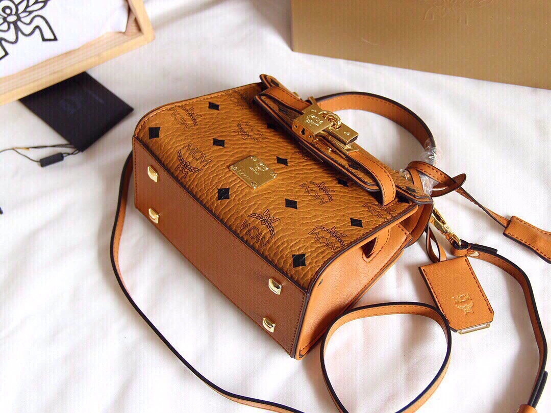 Indistinguishable MCM Top Handle Bags